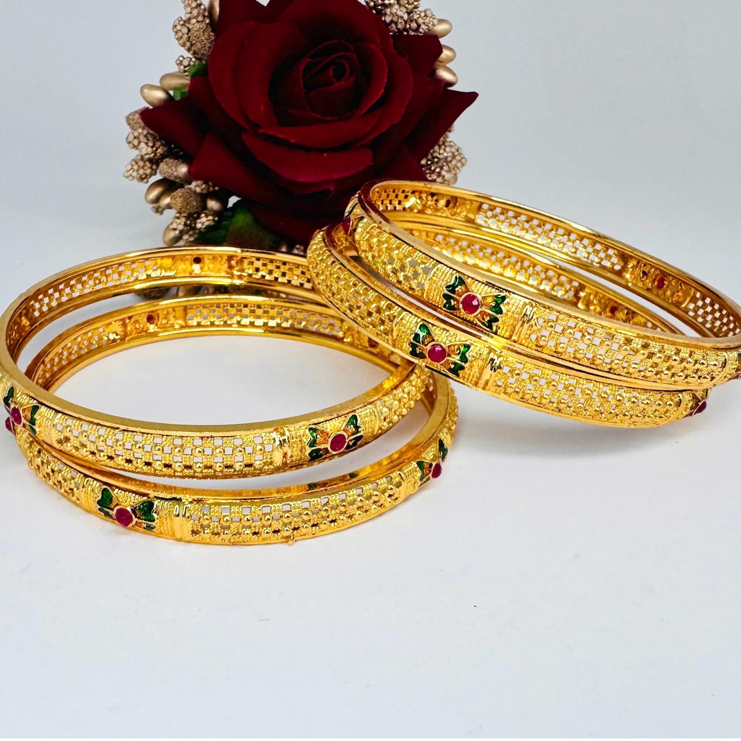 Elegant Gold-plated Traditional Indian Bangles With Intricate Design ...