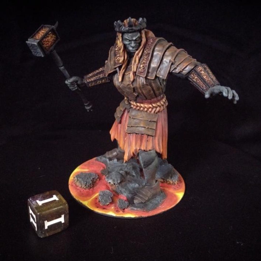 Nolzur's Fire Giant Holding a Battle Hammer Depicted Standing on Lava ...