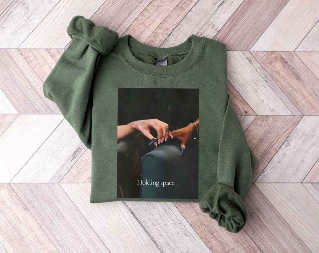 Wicked Sweatshirt, Holding Space Ariana Cynthia Finger Hold Defying ...