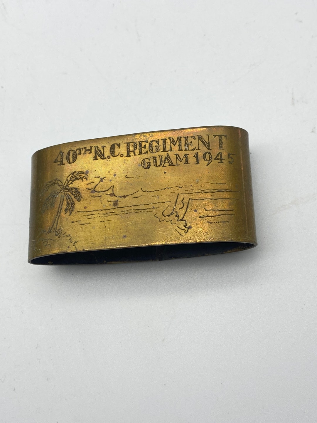 Vintage 1945 Trench Art 40th N.C. Regiment Guam 1945 Metal Shell Casing Art Napkin Ring Oval ...