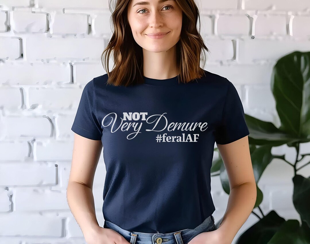 Not Very Demure Feral AF Woman Pink Shirt Funny Not Demure Feral AF ...