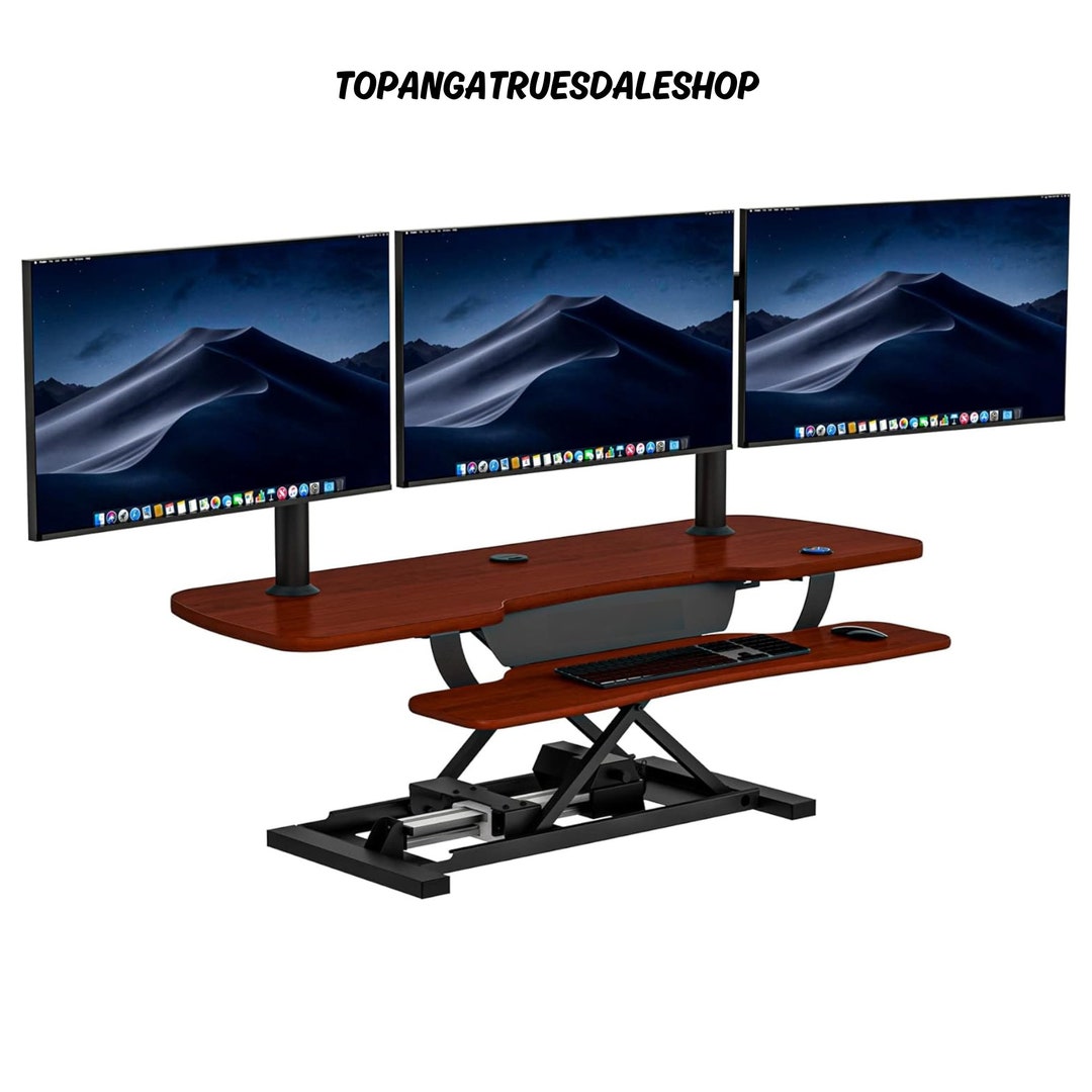 This is a 48-inch Electric Height Adjustable Ergonomic Desk Converter ...