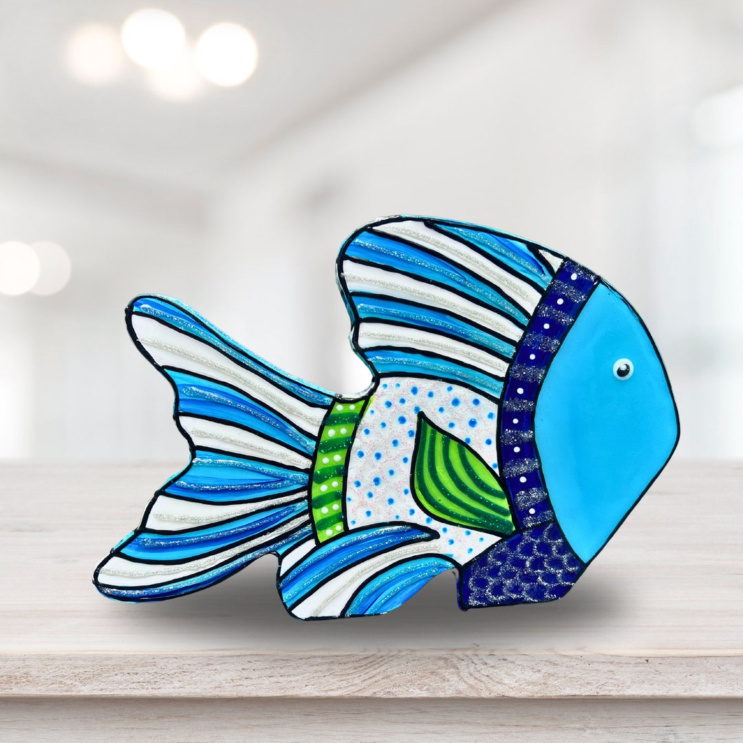 Meet Splash: A Spunky Fish With a Blue Face, White and Blue Fins, and a ...