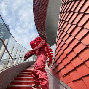 Crimson Rex: Tyrannosaurus Rex Skeleton Red Cloth, A Vibrant Tribute to ...