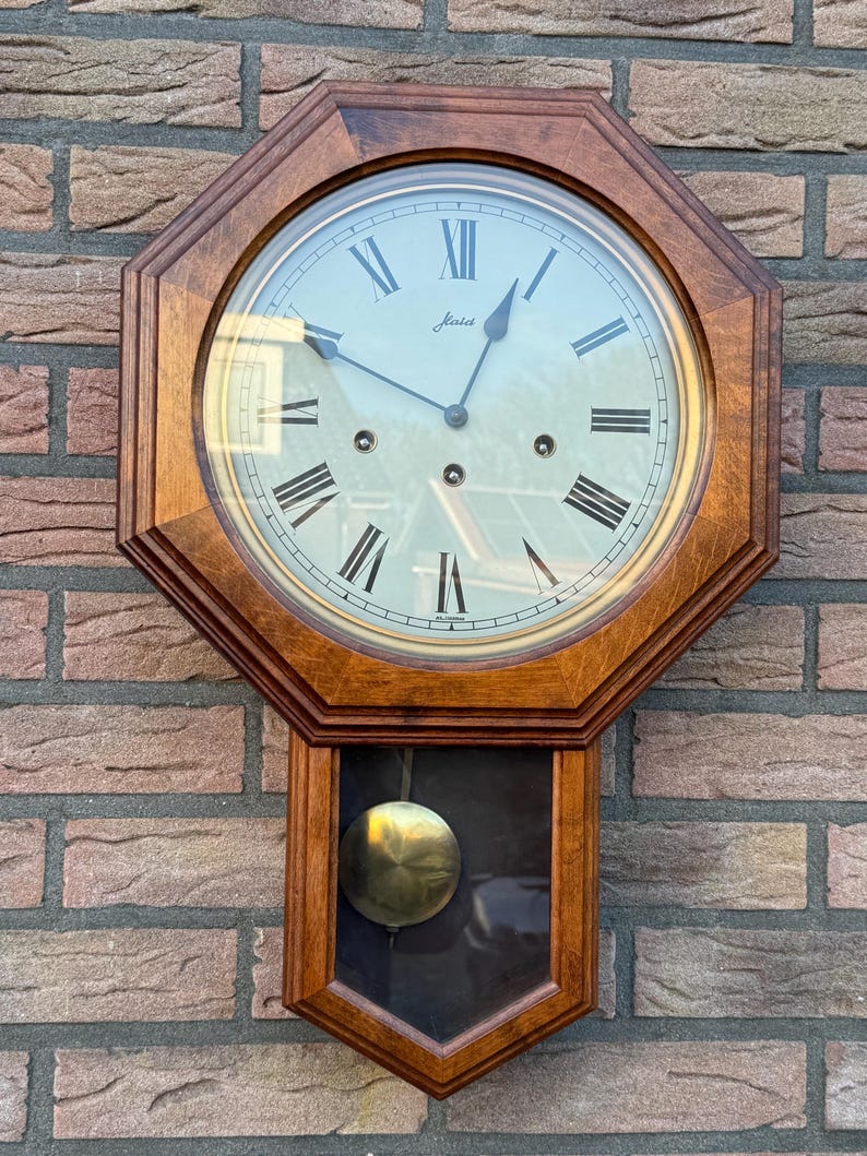 Westminster PUB Clock With Octagonal Mahogany Frame Around the Dial and ...