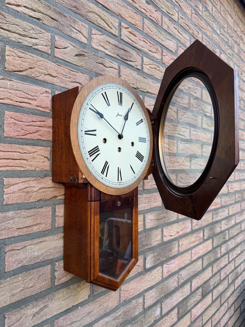 Westminster PUB Clock With Octagonal Mahogany Frame Around the Dial and ...