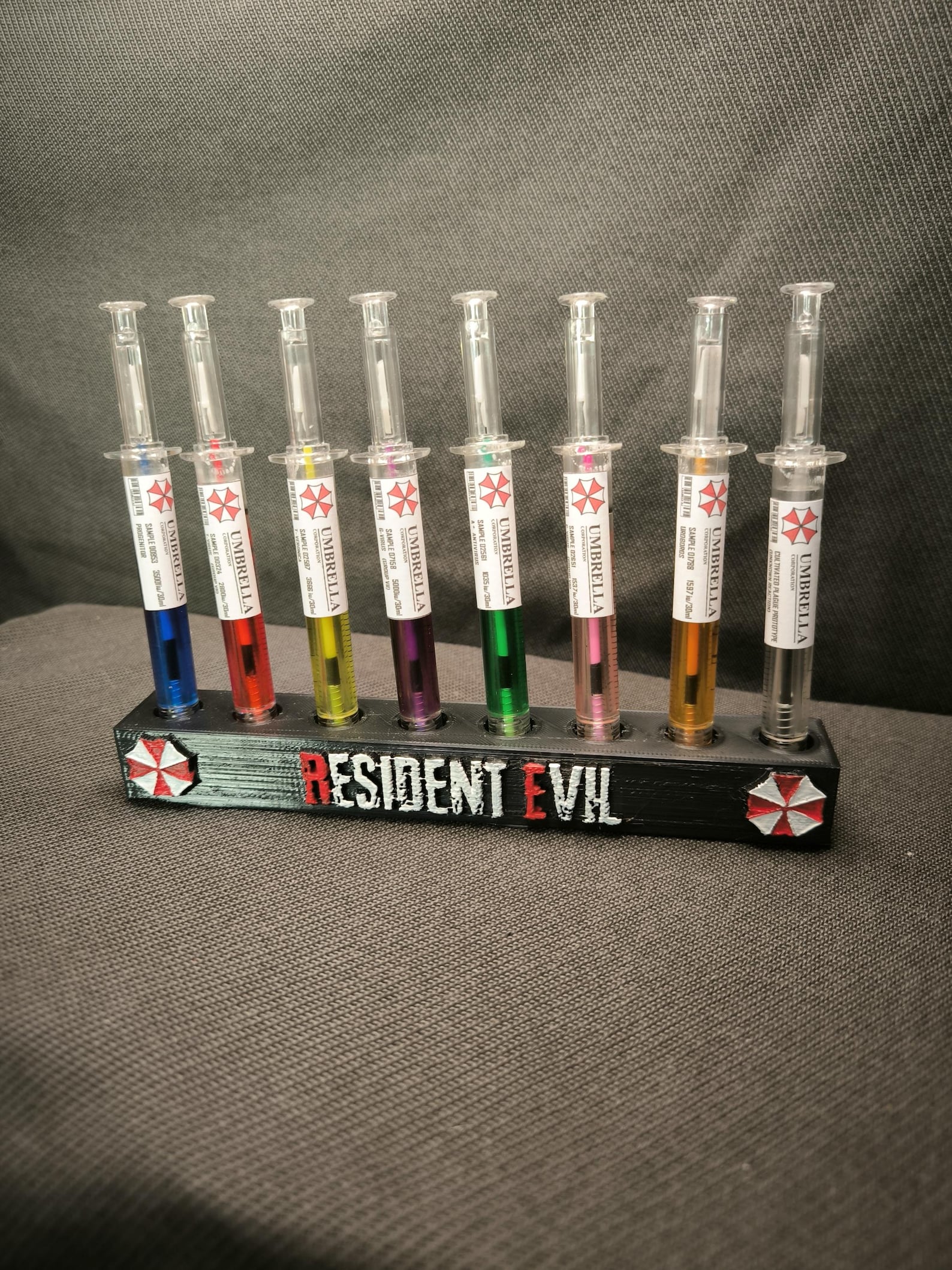 Resident Evil Display Stand With 8 Syringe Pens That Paint in Colors ...