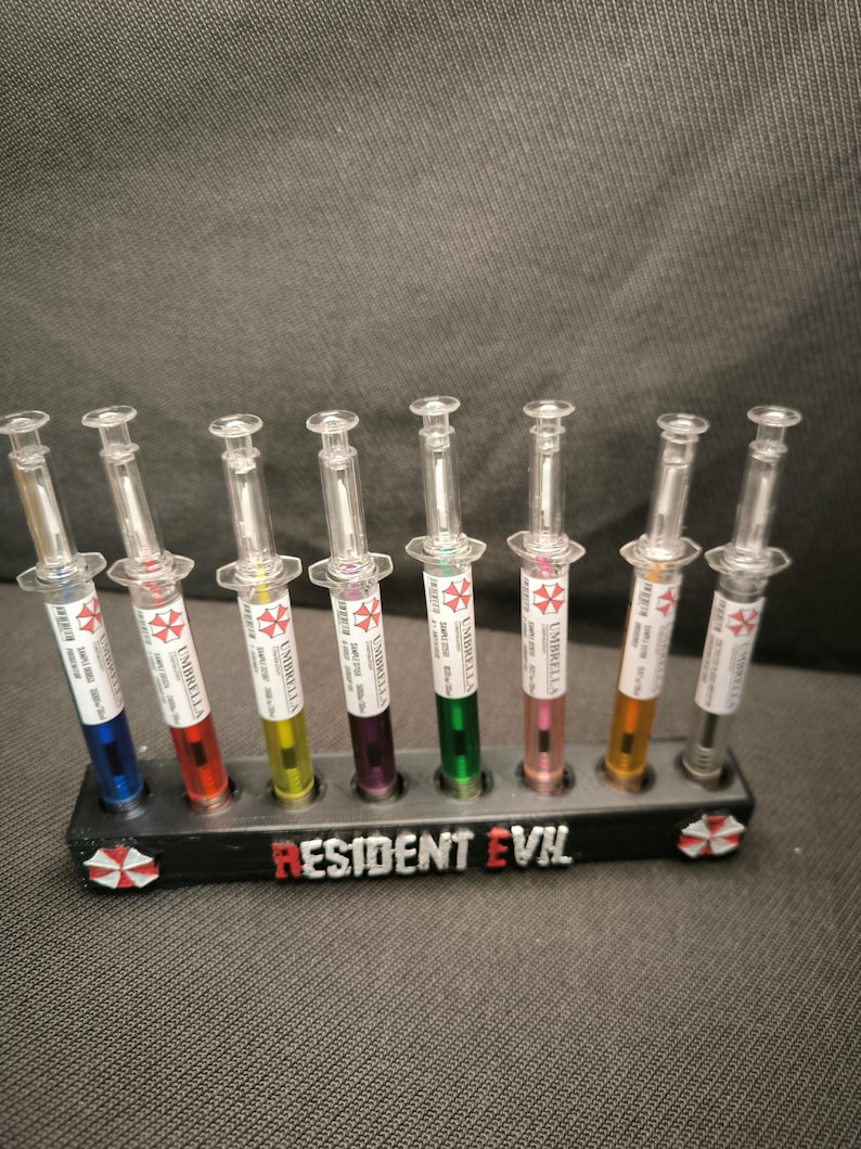 Resident Evil Display Stand With 8 Syringe Pens That Paint in Colors ...
