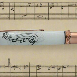 Pen: Black Music Notes Label Cast Click Pen With a White Background and ...