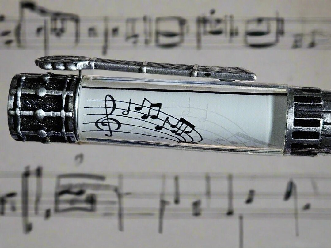 Musical Instruments Pen (piano, Drums, Guitar Represented) With an ...