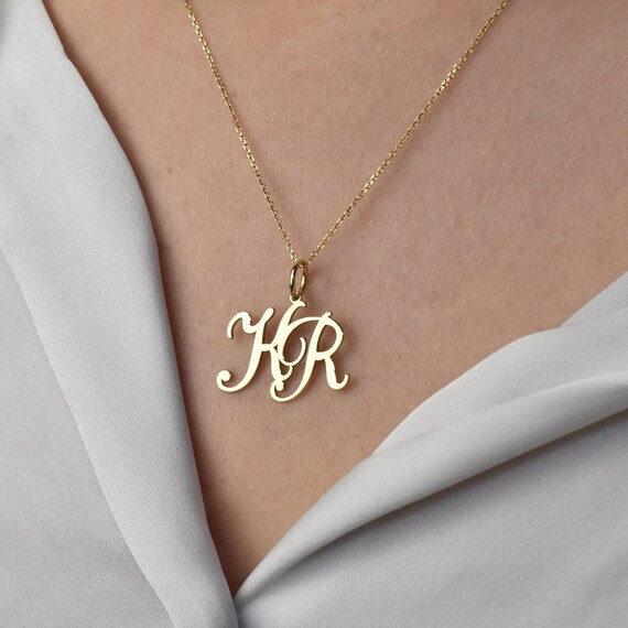 Gold name initial pendant store