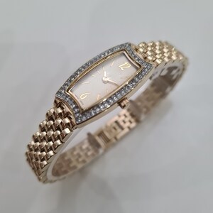 Gold Colour Women Wrist Watch, Stones on Case, Daily Usage Watch ...