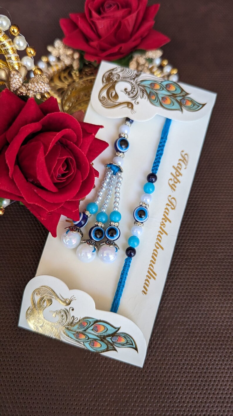 Rakhi for Bhaiya Bhabhi Couple Kids Evil Eye Kundan Diamond Pearl ...