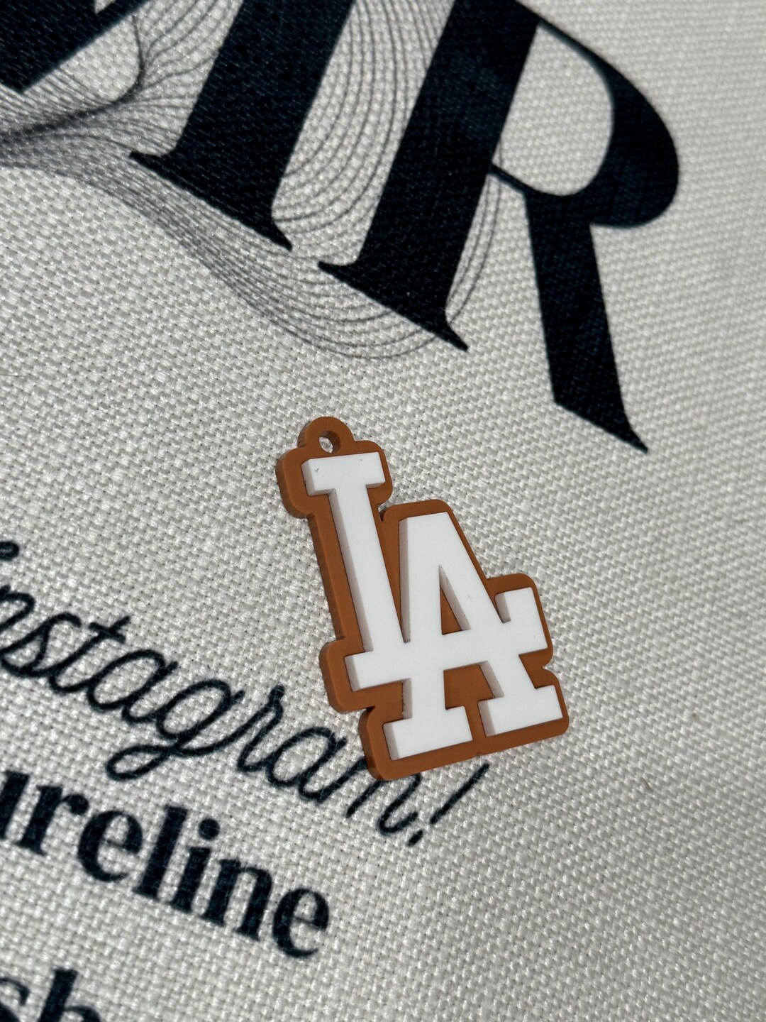 La Logo Keychains - Etsy