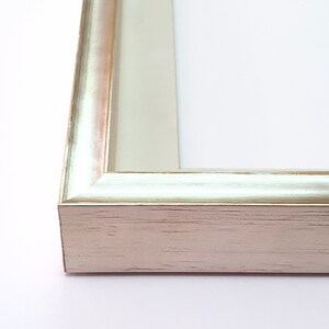 This White Frame Offers the Perfect Blend of Style and Protection ...