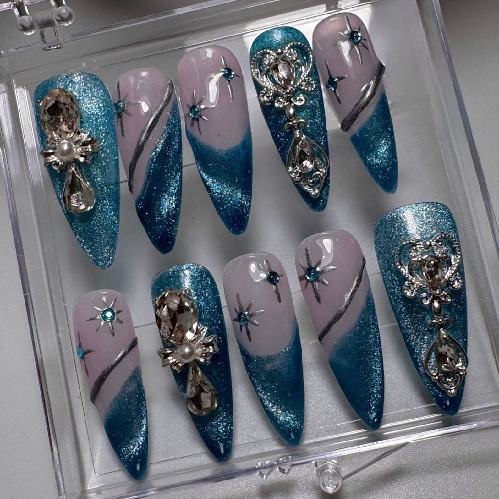 Blue Glitz Cat's Eye: Blue Cat Eye Silver Chrome Nails Unique Nail ...