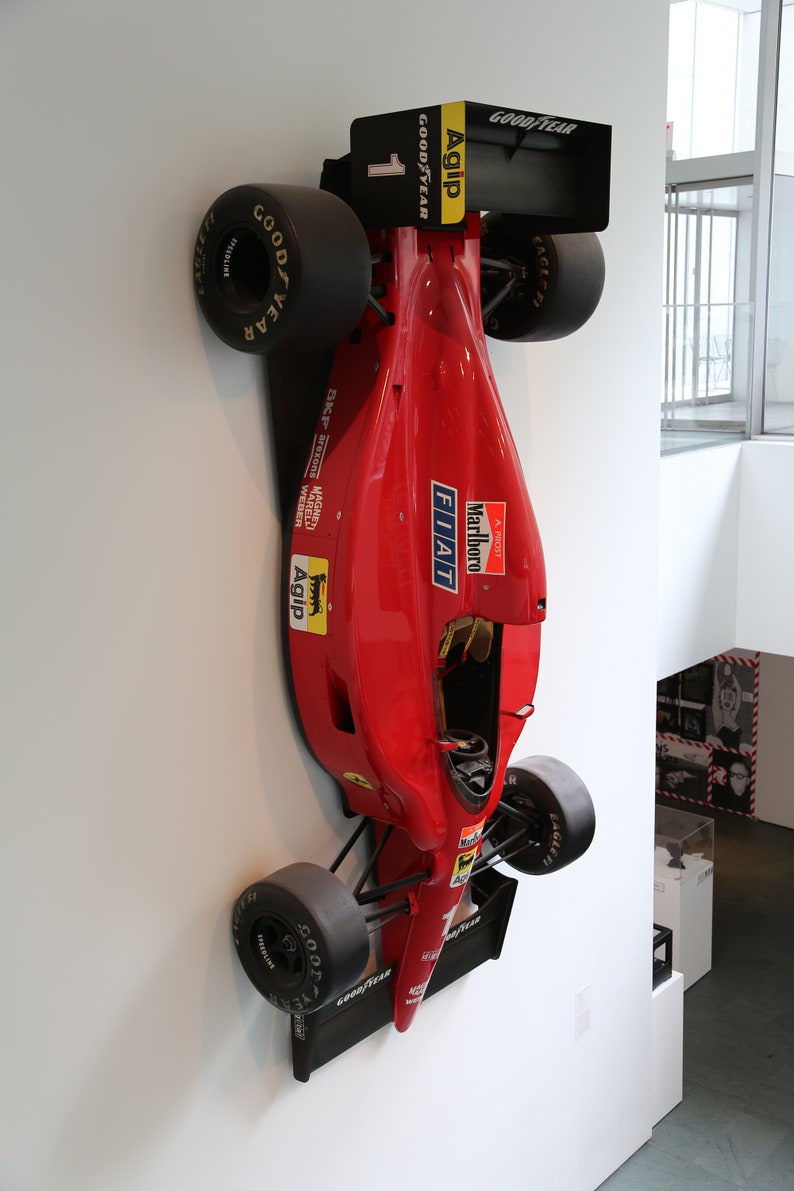 Wall Mounted Red Ferrari 1990 641 F1 Car in a Business’ Lobby, New York ...