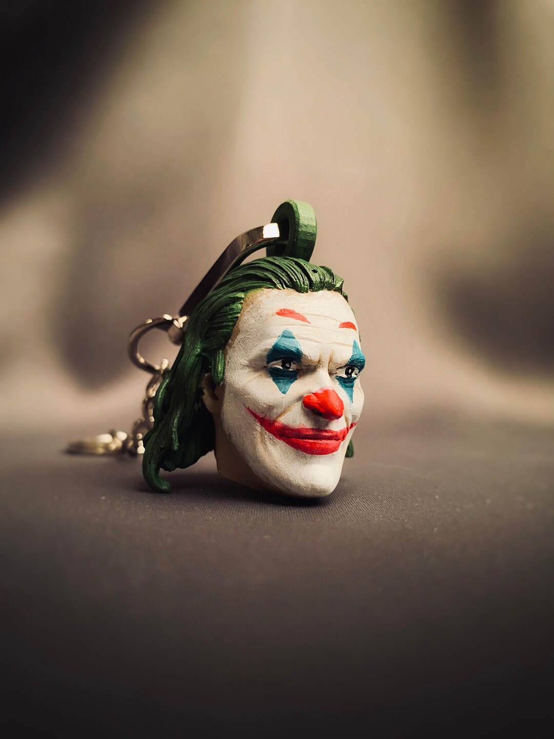 Joaquin Phoenix's Iconic Joker Keychain From Joker Keyring - Clown ...
