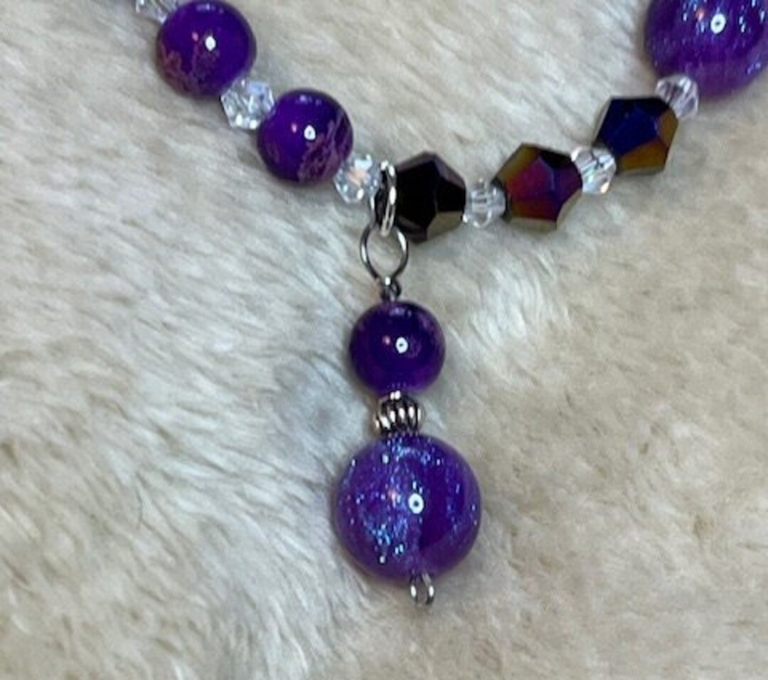 Sparkling Deep Purple Pendant, With Swirls of Glitter. the Necklace Has ...