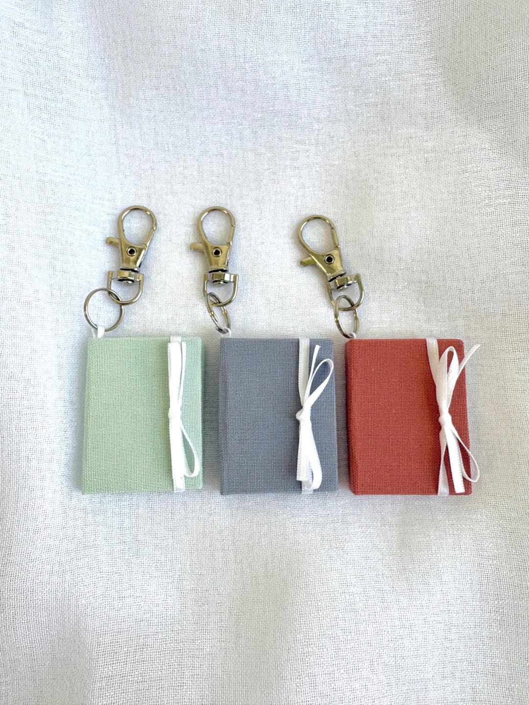 Hand Bound Book Keychain / Bag Charm | Cute Bows - Etsy