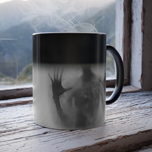 Phantom Veil A Black Mug That Morphs Into A White Mug With A Zombie ...