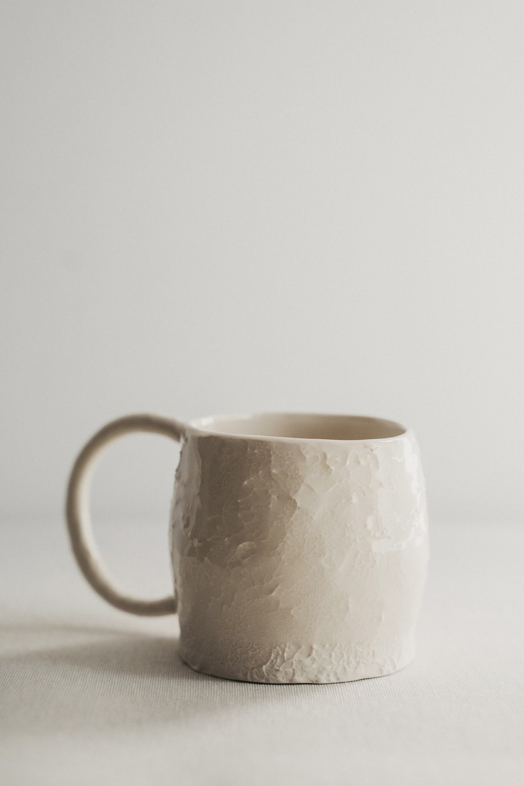 Mug With Texture and Handle Made of Porcelain With Glossy Finish ...