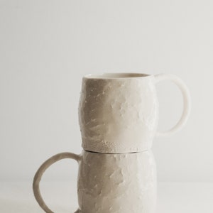 Mug With Texture and Handle Made of Porcelain With Glossy Finish ...