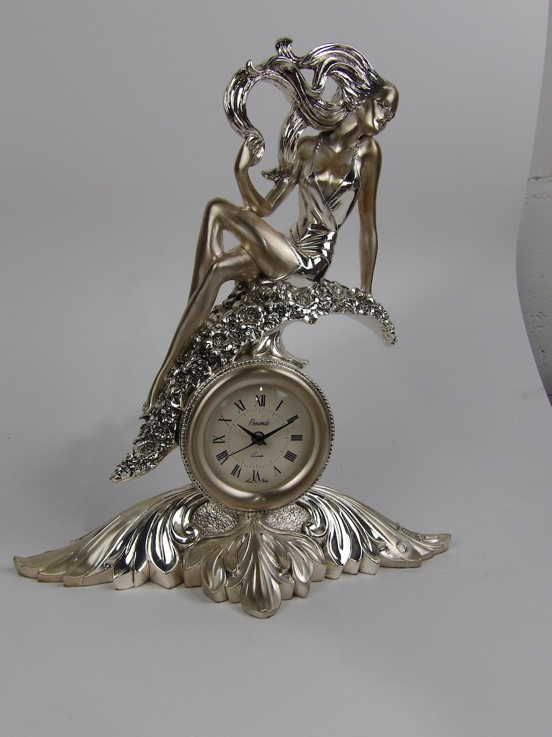 Silver-coated Resin Clock - Woman Sitting on Flowers: A Blend of Art ...