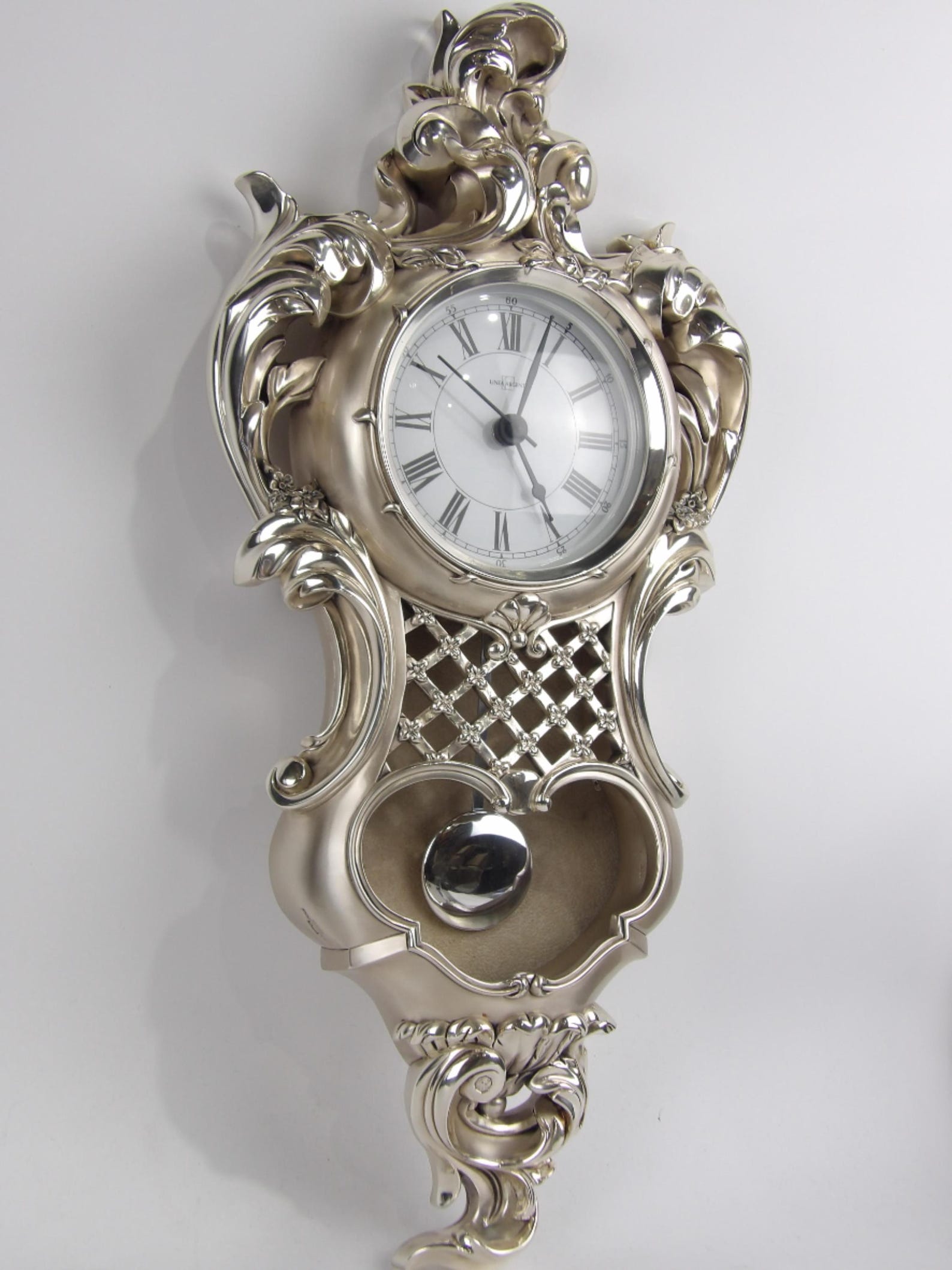 Elegant Pendulum Wall Clock in Silver Resin – Ornate Decorative Design ...
