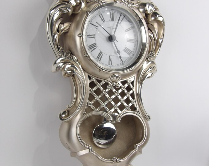 Elegant Pendulum Wall Clock in Silver Resin – Ornate Decorative Design ...