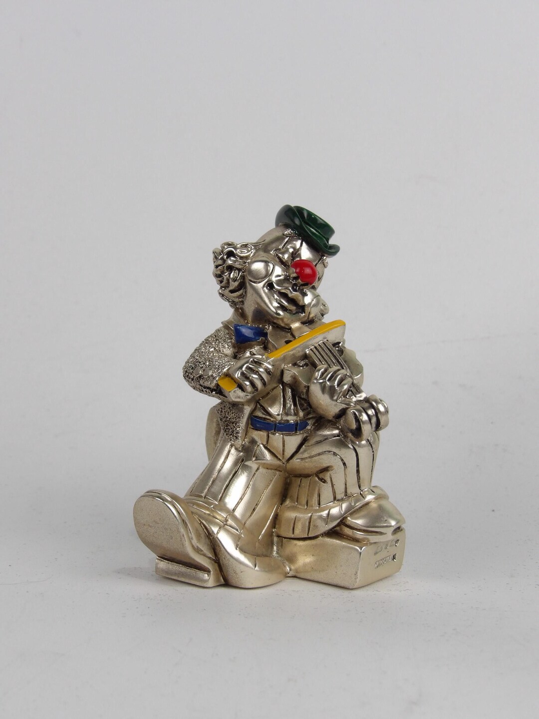 Silver Resin Clown With Colored Details – Whimsical and Vibrant Art ...