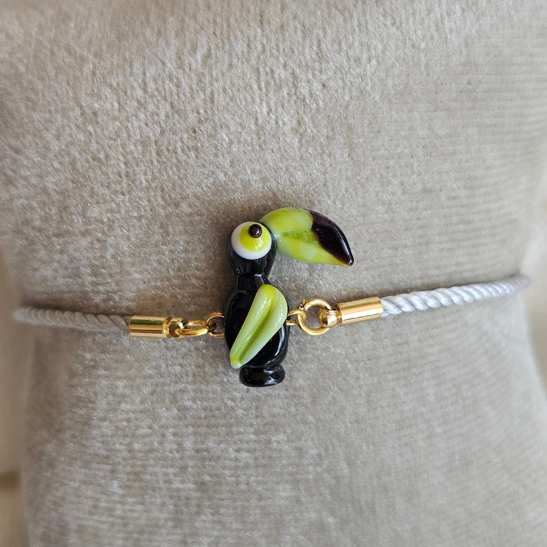 Toucan Bird Charm Bracelet - Symbol of Abundance, Wisdom, and Joy - Etsy