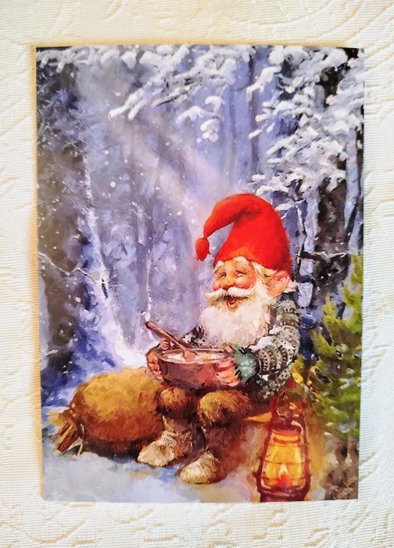 Nordic Happy Gnome Christmas Card - Gnome Sitting in Winter Eating Rice ...