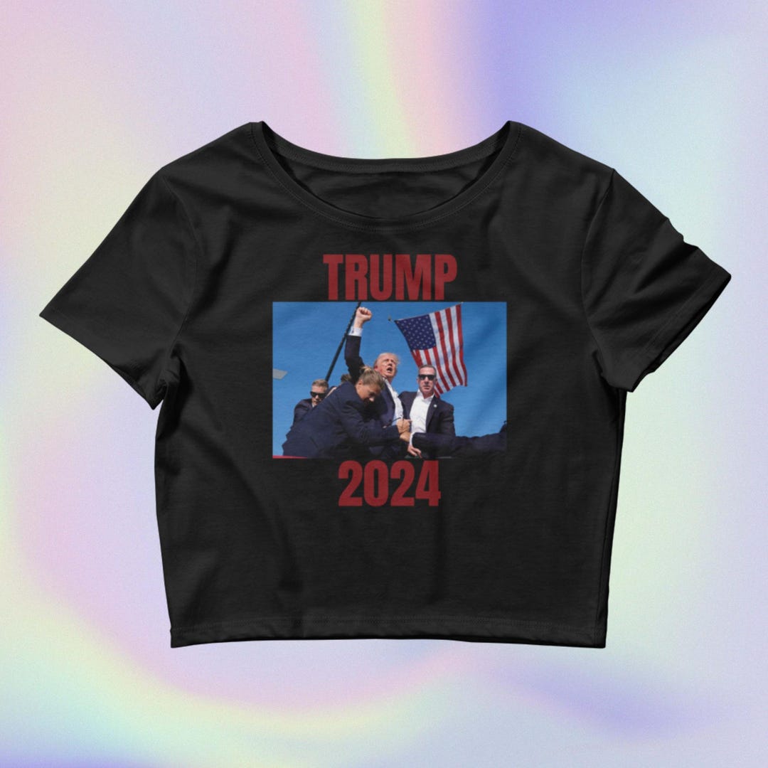 TRUMP ASSASSINATION ATTEMPT Make America Great Again Crop Top Baby Tee ...