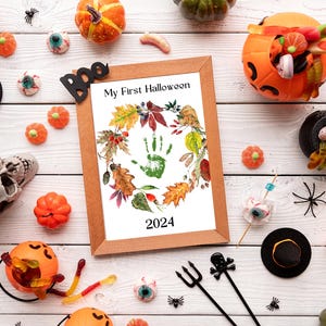 Baby's First Halloween Handprint Craft, Printable | Baby Halloween Art ...