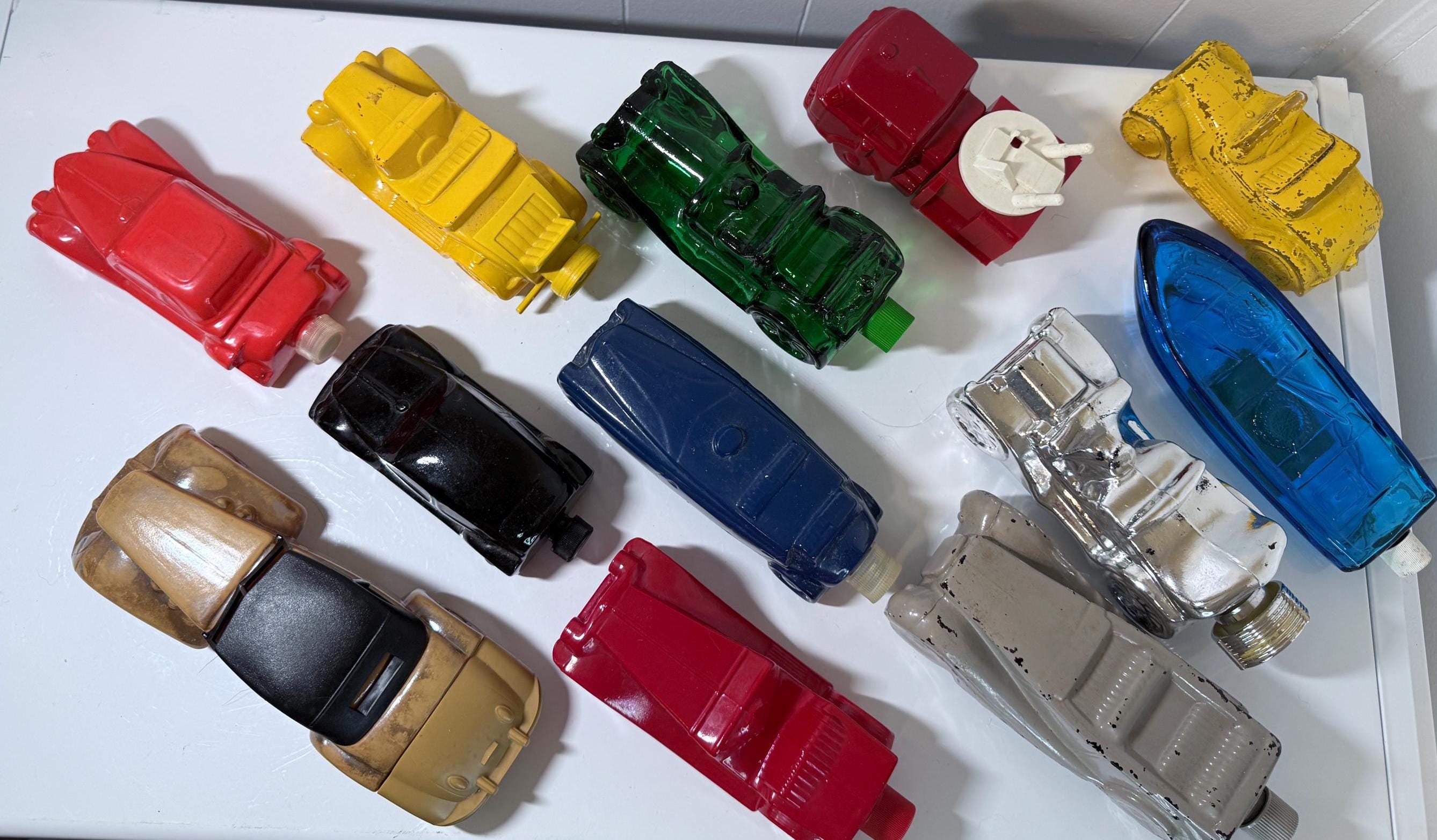 Vintage, 12 Avon Car Cologne Bottles, 1 Boat, 1 Firetruck, 10 Cars ...