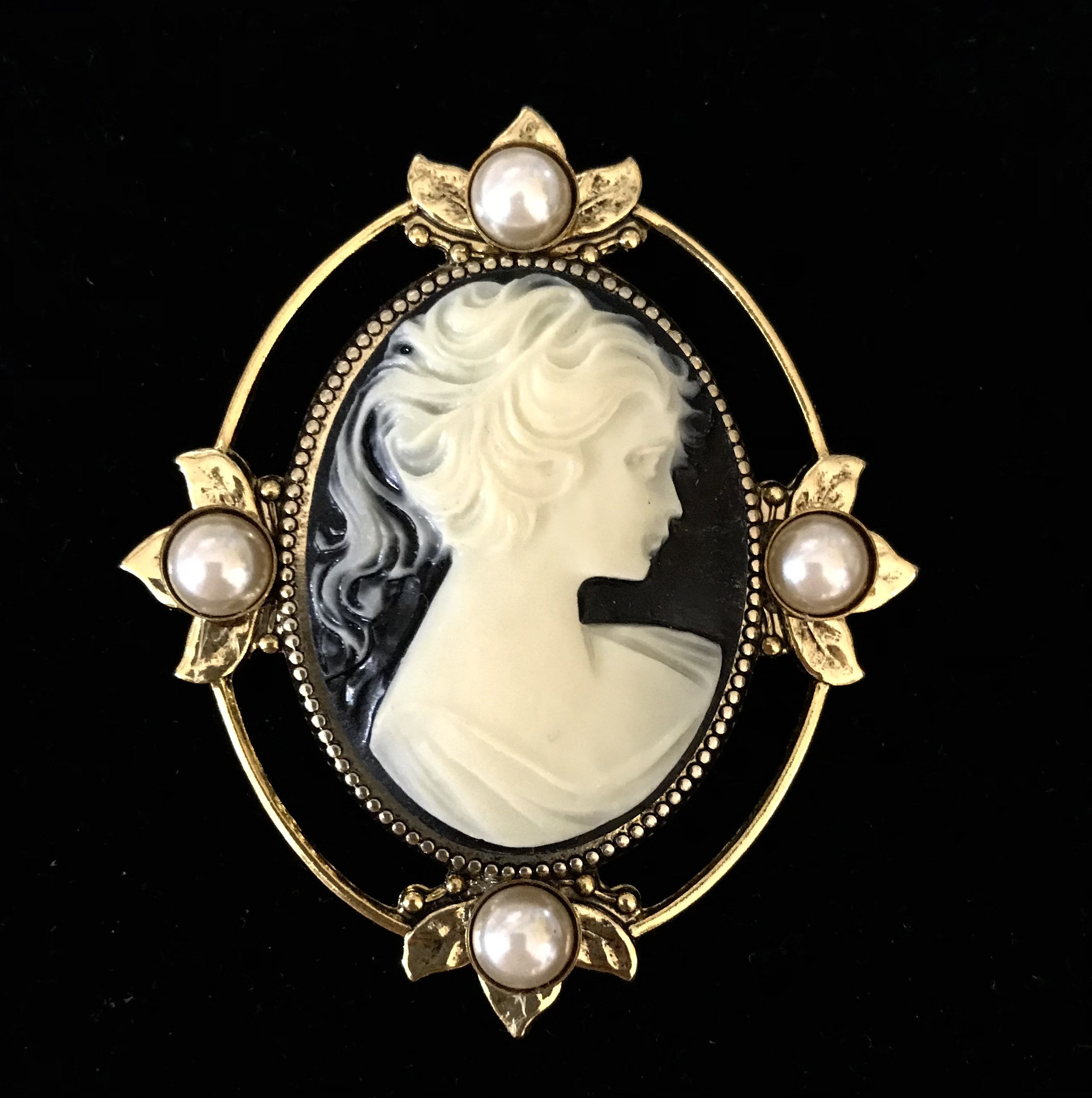 Vintage black cameo brooch store