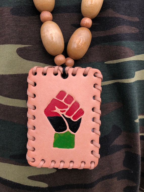 Pan African Struggle Fist Puff Medallion Necklace Natural | Etsy