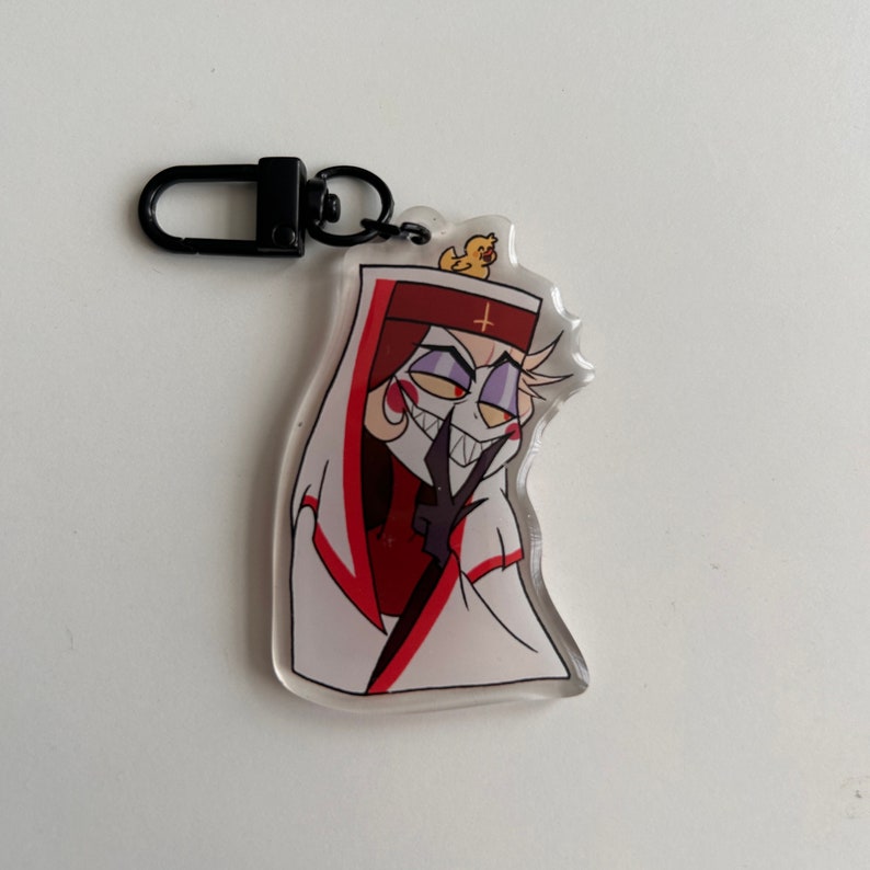 IN STOCK: Lucifer and Alastor Radioapple Nun Hazbin Hotel Keychains - Etsy