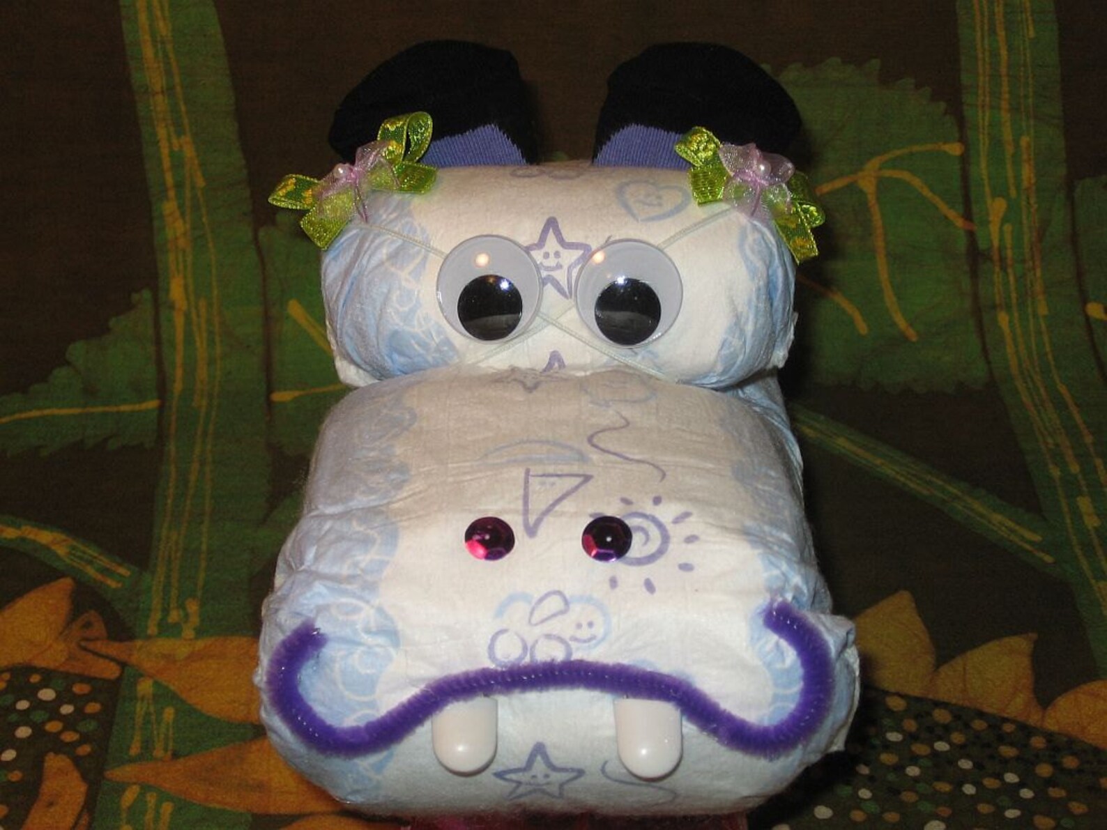 Instructions How to Make Hippos From Diapers. Diaper Cake Directions ...