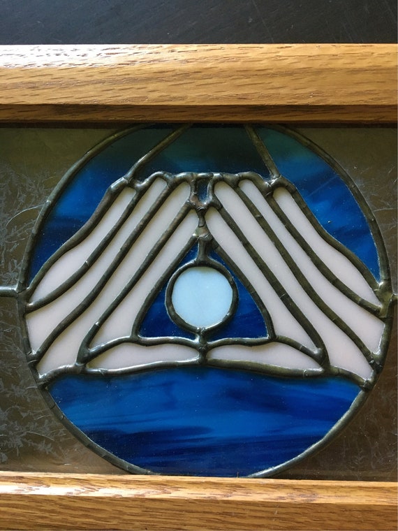 Stained glass hands box hand gesture posed in a trian… - Gem