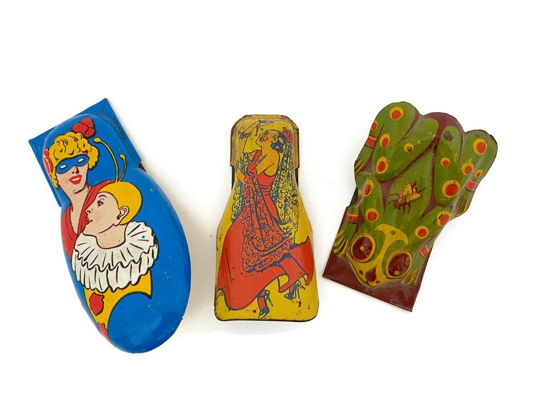 Midcentury Tin Litho Clickers, Frog, Flamenco Dancer, and a Party ...