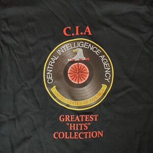 CIA Greatest Hits Collection Volume One T-shirt - Etsy