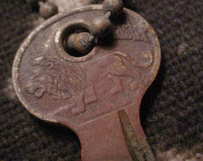 Old Master Lock With Embossed Lion Key and Red Wood Fob - Etsy