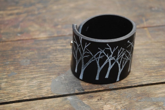 Items similar to Leather Cuff with Repeating Bare Trees on Etsy