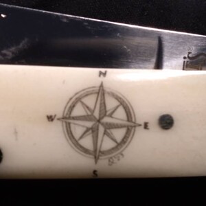 Scrimshaw canoe Folding Knife With Classic Ship and Compass Rose - Etsy