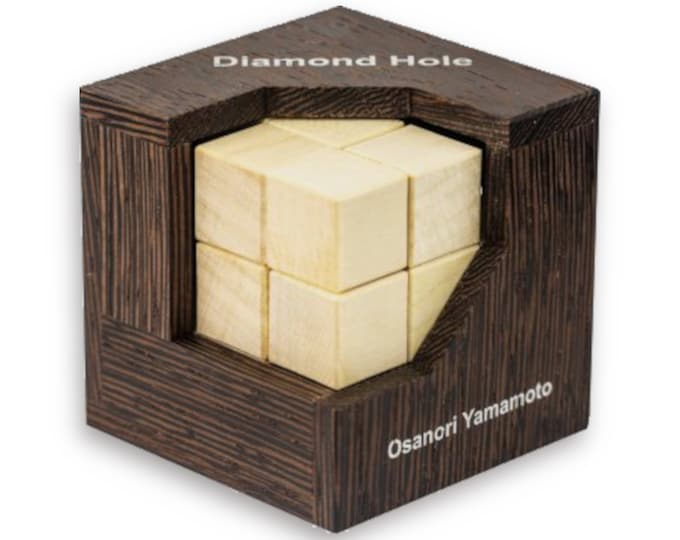 Diamond Hole Wood Puzzle by Pelikan Puzzles is a Wooden Box Filling ...
