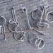 Hanayama Wire Puzzle Set - Orange Contains 5 Mini Wire Puzzles. IQ ...