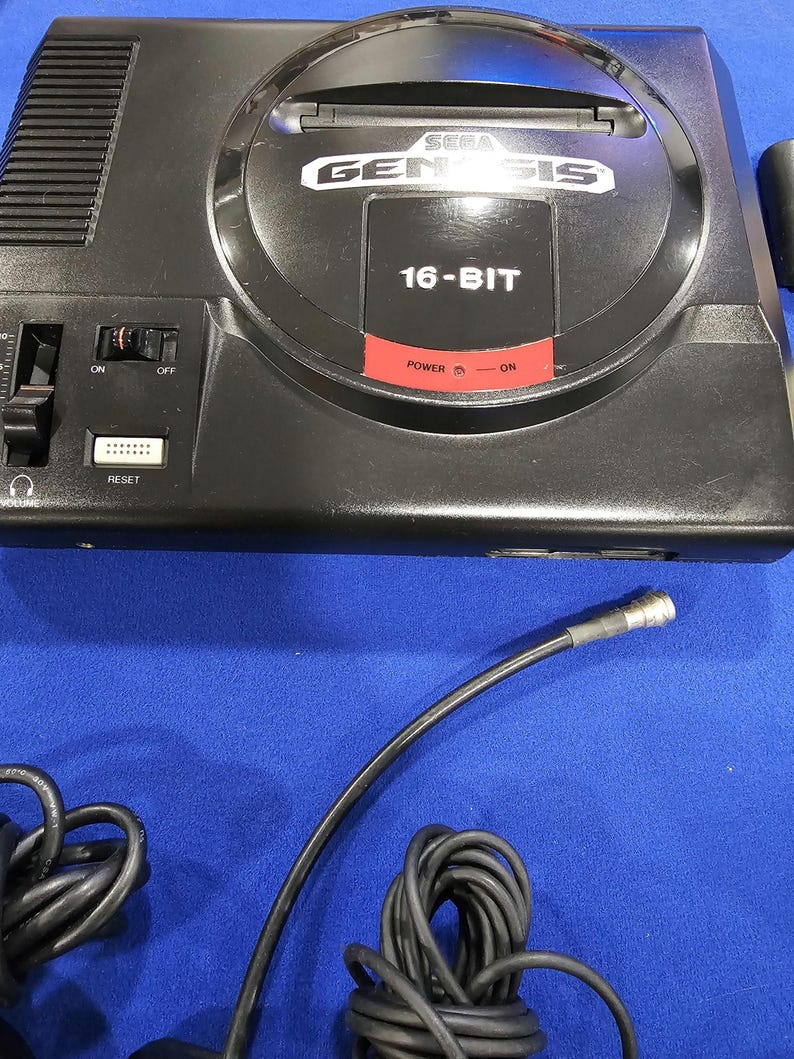 Sega Genesis Model 1 Comes With Cords, Controller and 2 Games. Tested ...