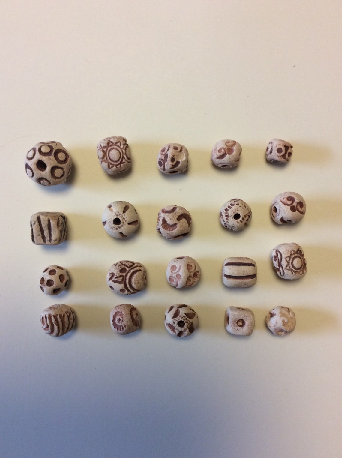 25 Small Textured Clay Beads | Etsy